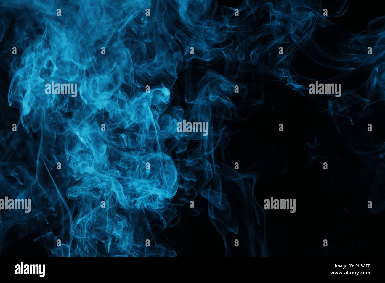blue steam on black background with copy space Stock Photo - Alamy