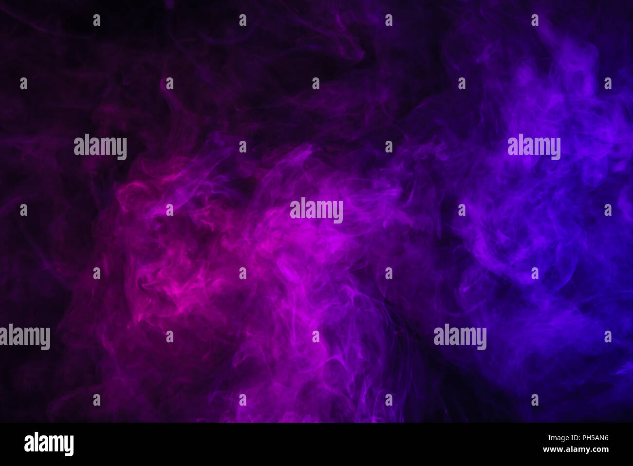 violet smoke on black background with copy space Stock Photo - Alamy