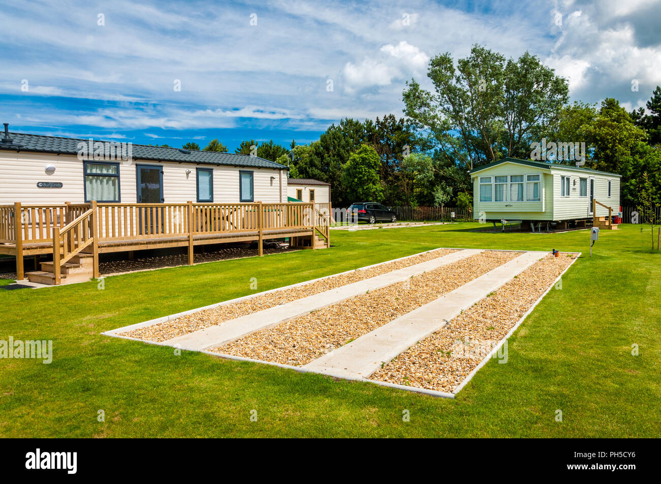 An empty space for a static caravan in Norfolk Stock Photo - Alamy