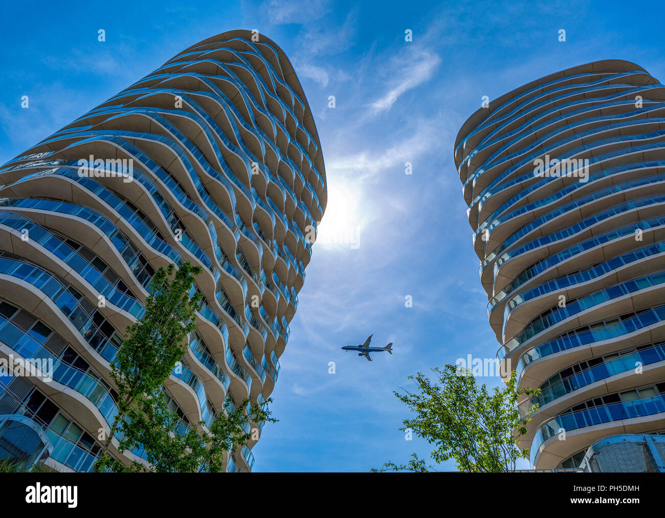 2018, two buildings with an aeroplane in the middle Stock Photo - Alamy