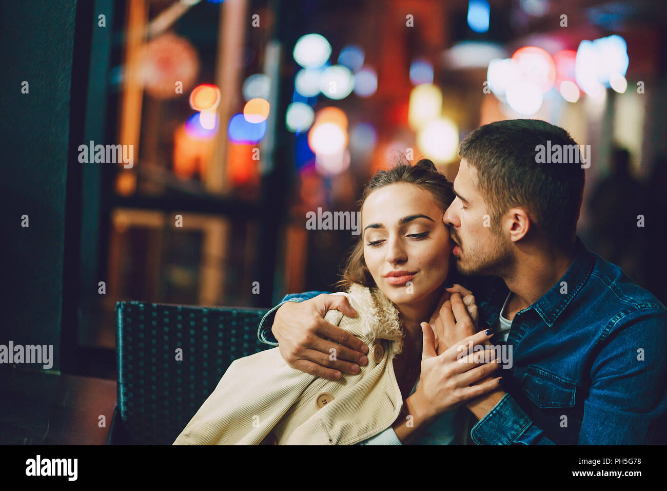 couple drinking coffee outside Stock Photo - Alamy
