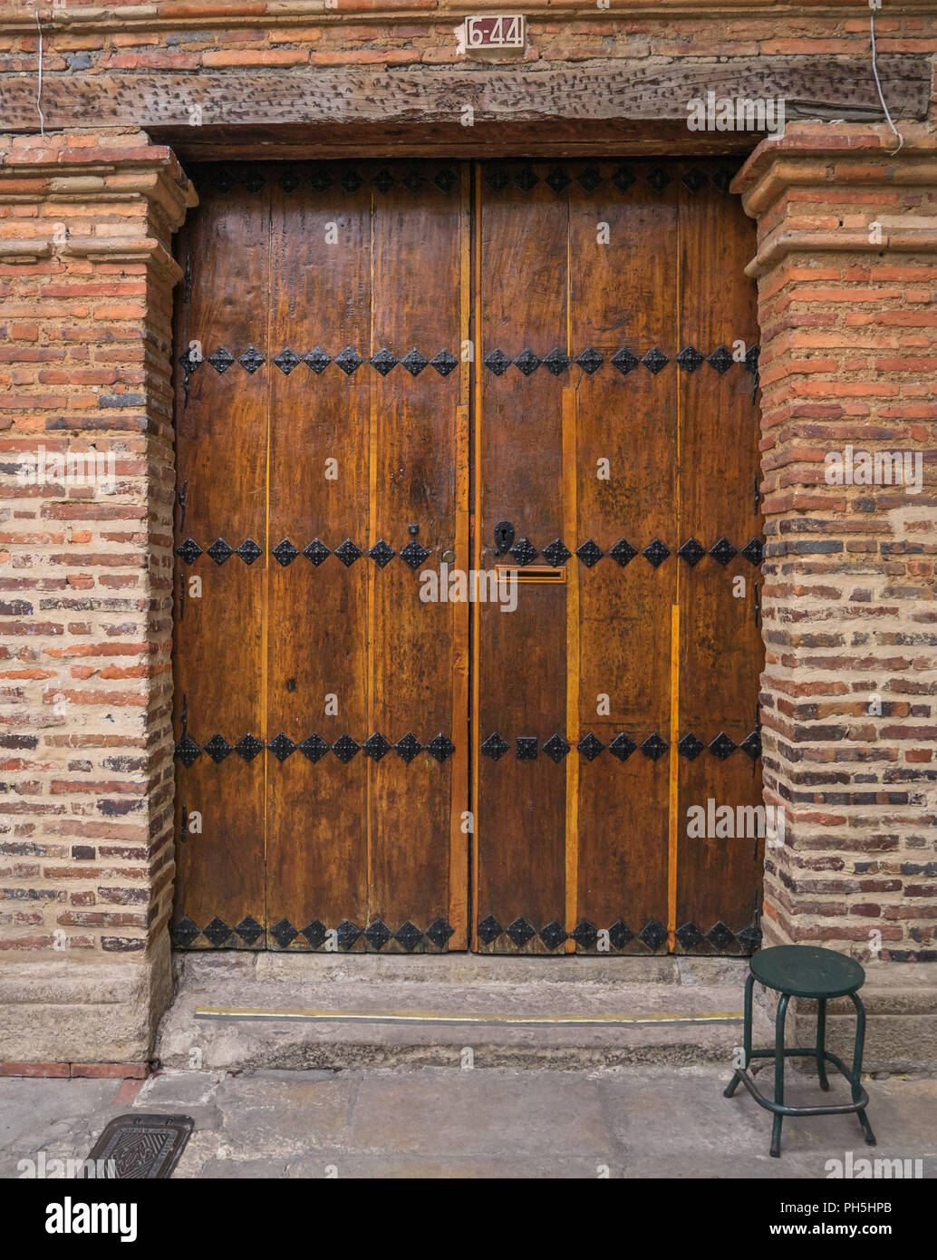 traditional colonial era door in the streets of Bogota, Columbia Stock ...