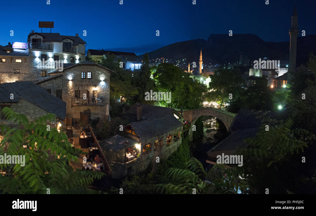 Mostar: night skyline and Kriva Cuprija (Sloping Bridge), the oldest ...