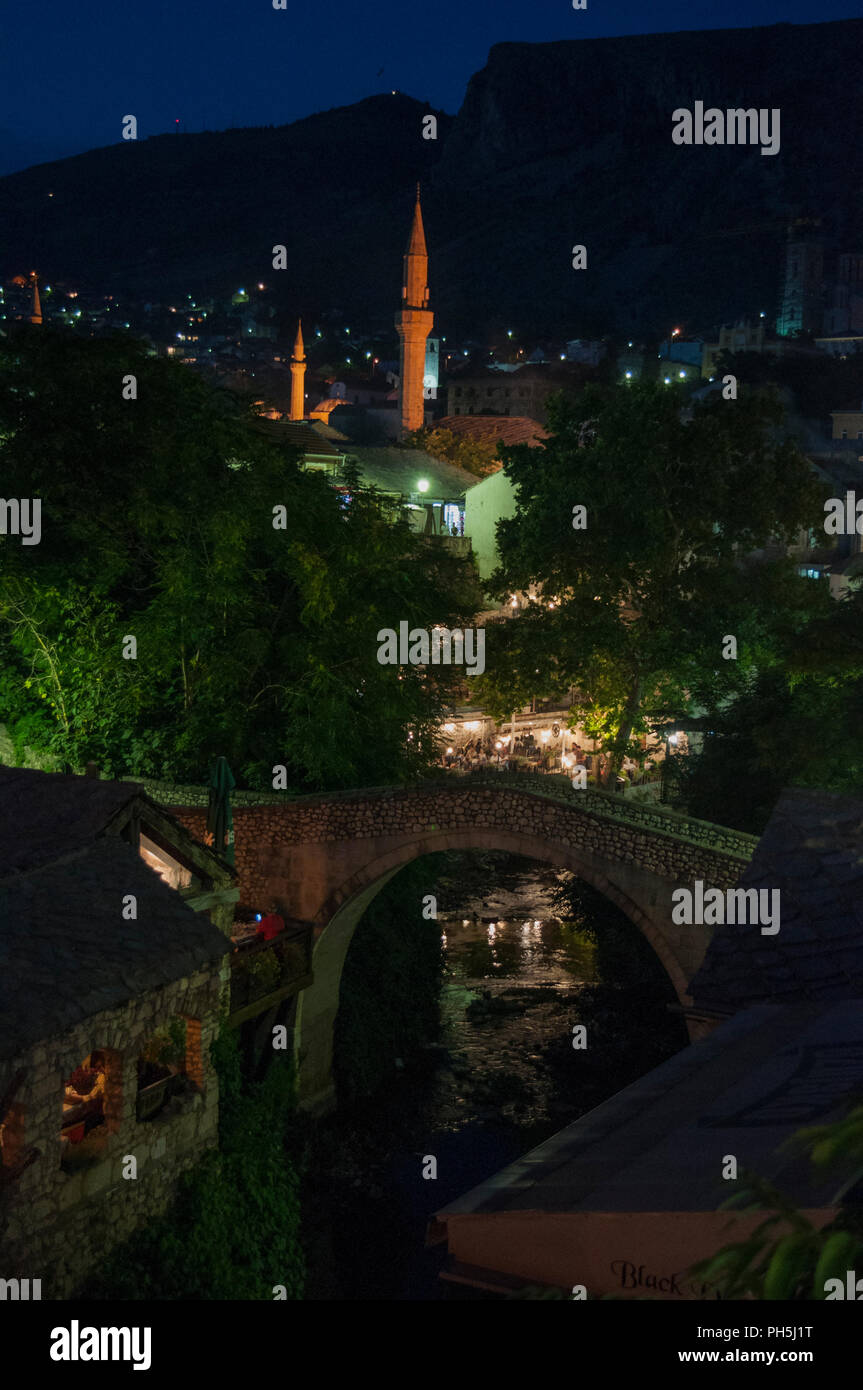 Mostar: night skyline and Kriva Cuprija (Sloping Bridge), the oldest ...