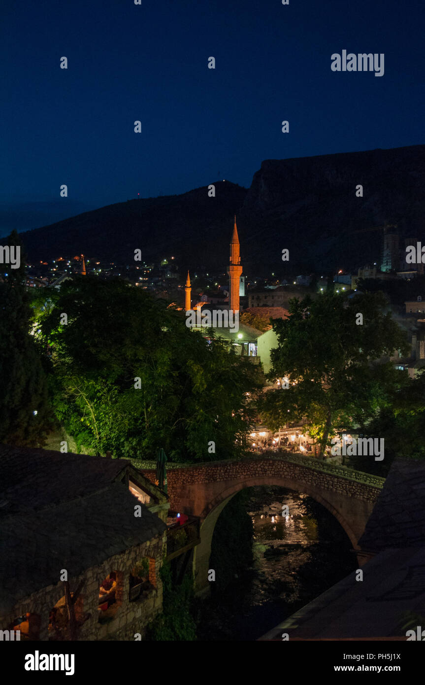 Mostar: night skyline and Kriva Cuprija (Sloping Bridge), the oldest ...