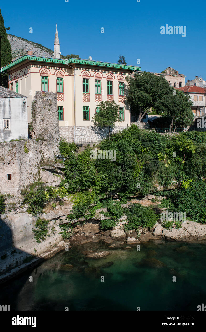 Bosnia: the skyline of Mostar with a palace example of Austro-Hungarian ...