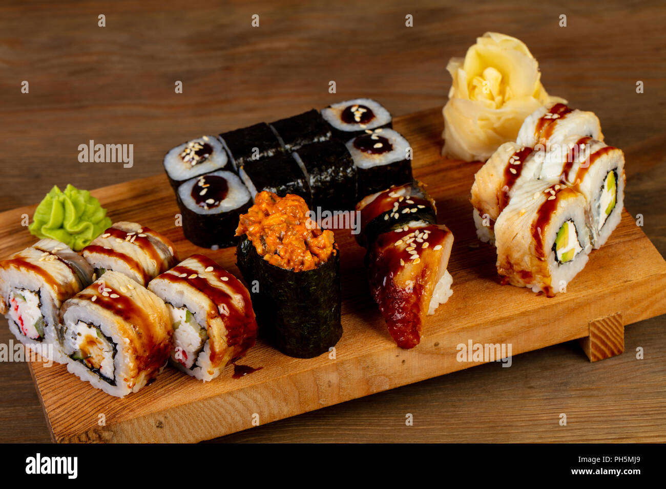Japanese rolls set plate mix Stock Photo - Alamy