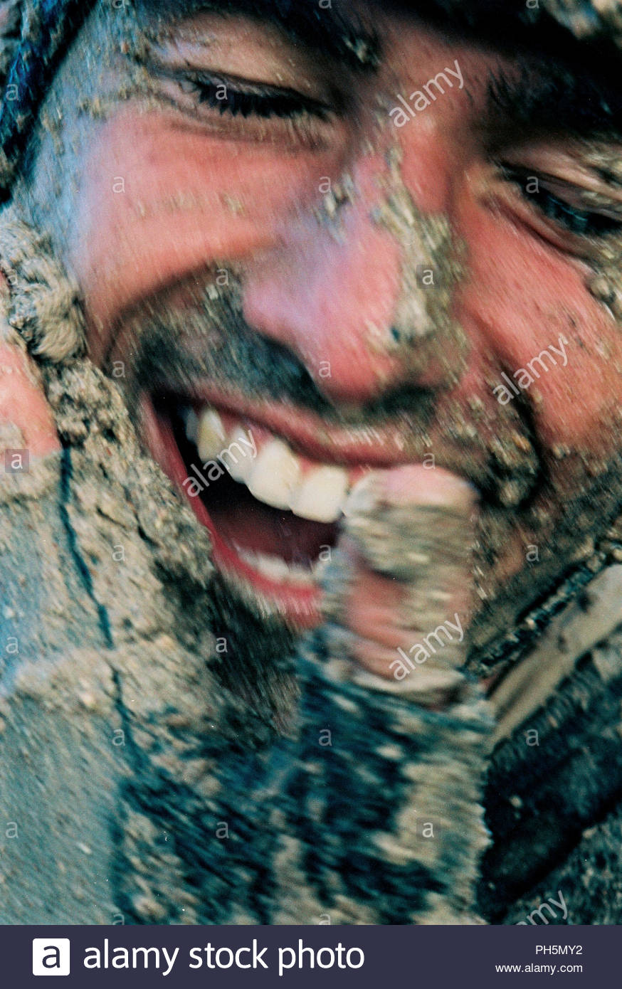Young Man Covered In Mud High Resolution Stock Photography and Images ...
