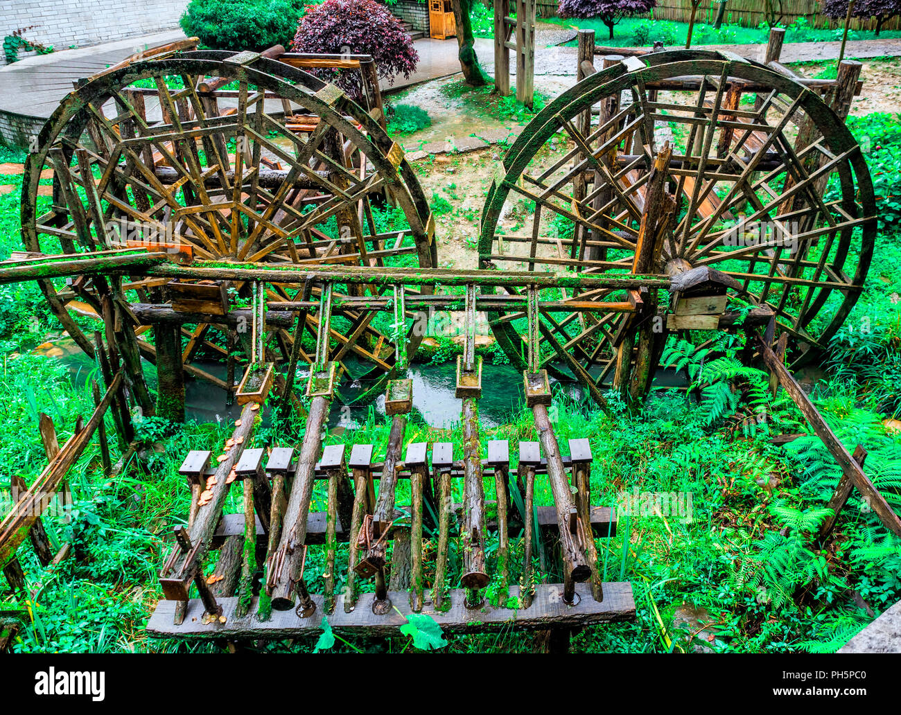 Wooden Watermill at the garden of the Yellow Dragon Cave: The wonder of ...