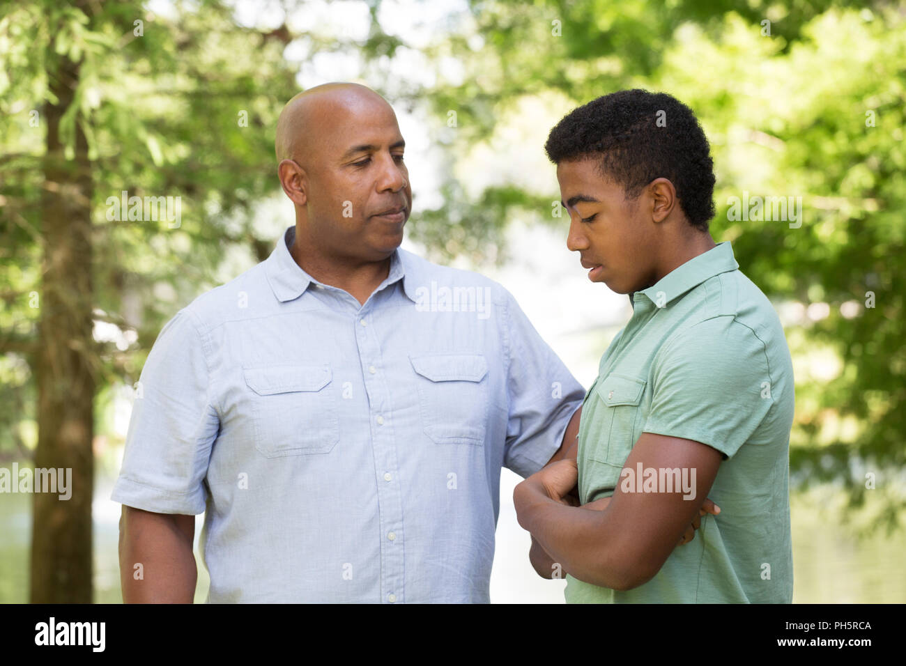 Father and son having a serious conversation Stock Photo - Alamy