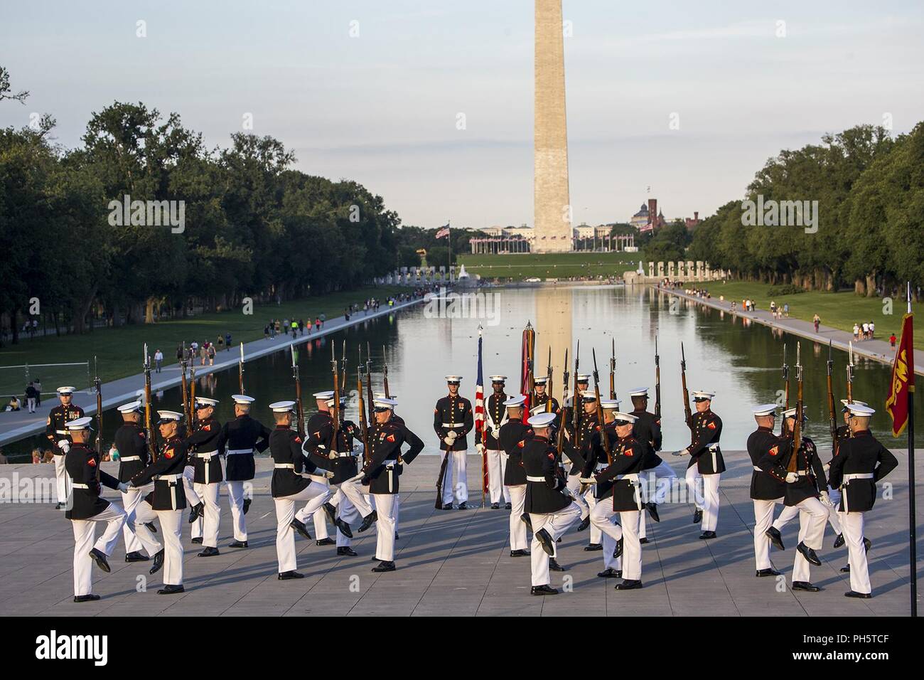 Marines with the U.S. Marine Corps Silent Drill Platoon perform ...