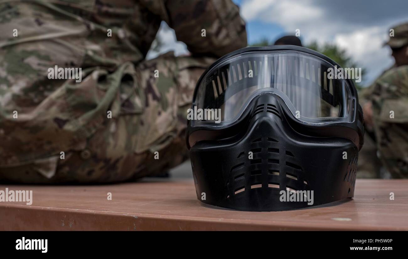 A paintball mask sits on a picnic table during a Delta Detachment, 1st ...