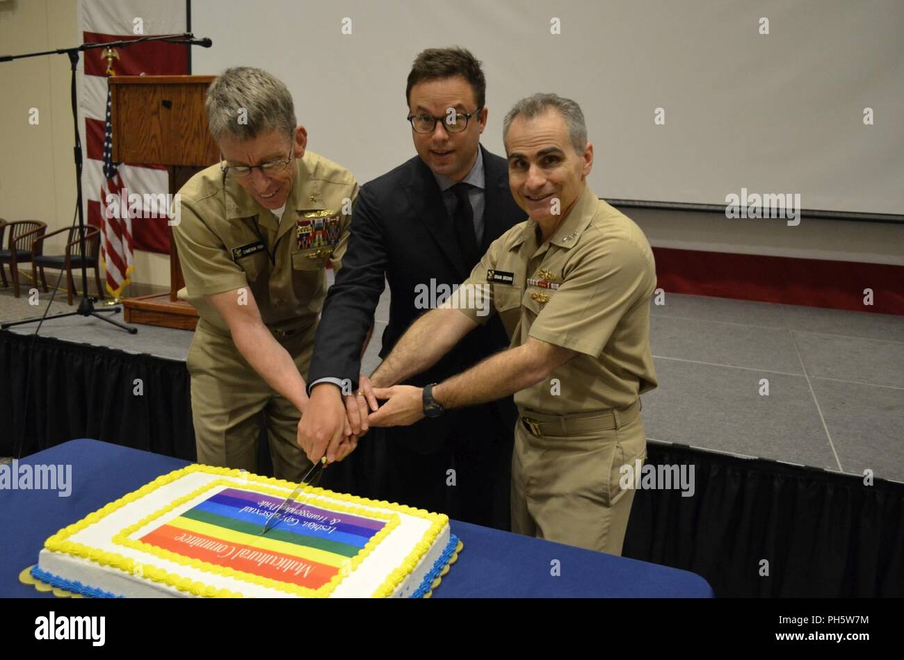 (Left to right) Guest speakers; Capt. Cameron Fisher, Naval Information ...