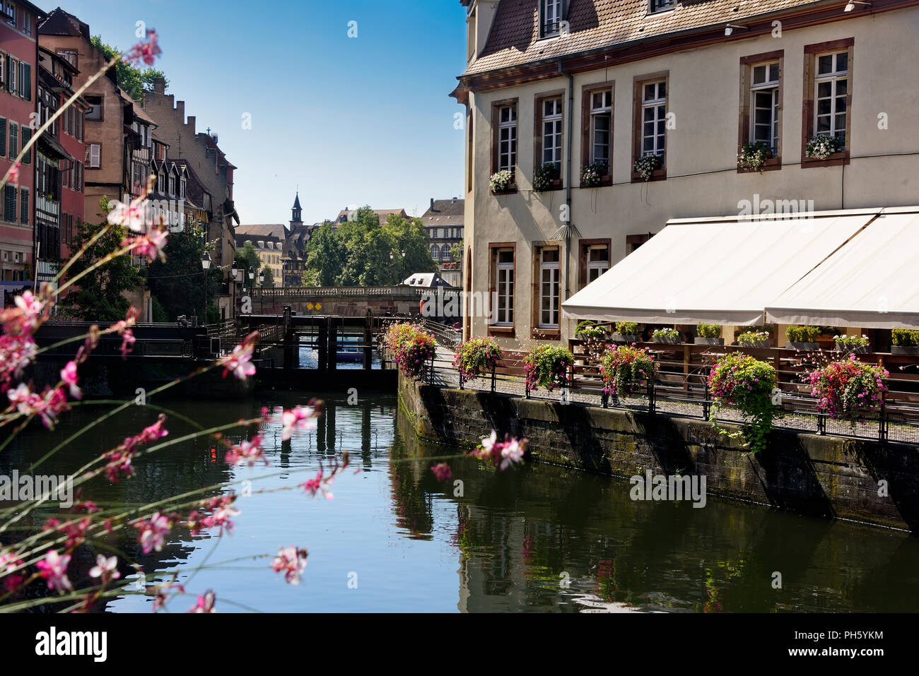 Water canals run through the village of Strasbourg in France Stock ...