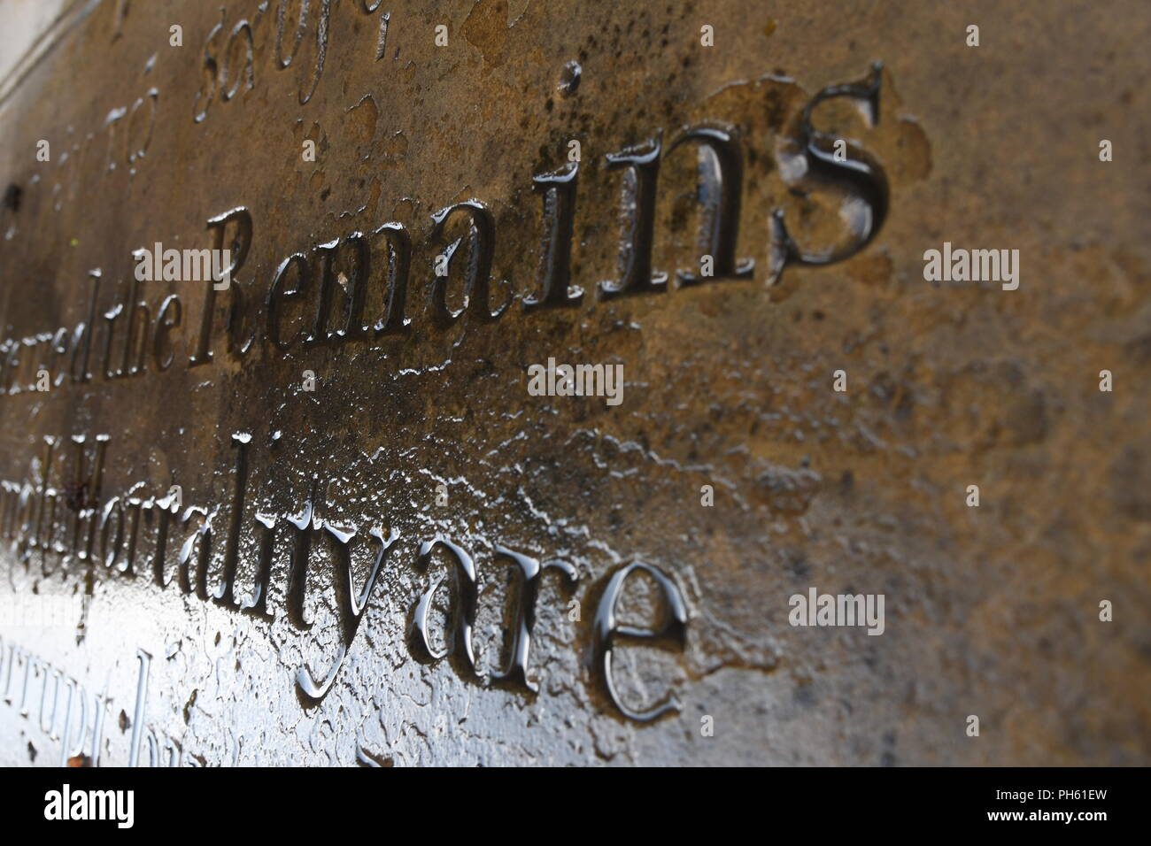 Wet inscriptions on burial vaults hi-res stock photography and images ...