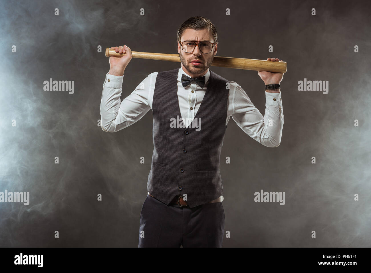 Man holding baseball bat hi-res stock photography and images - Alamy