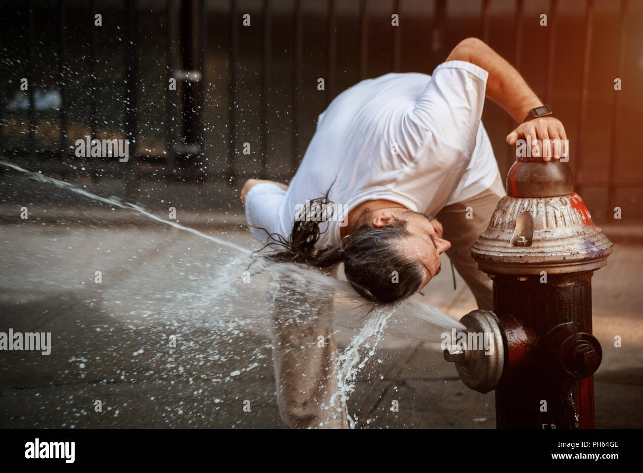 Dropping water on head hi-res stock photography and images - Alamy