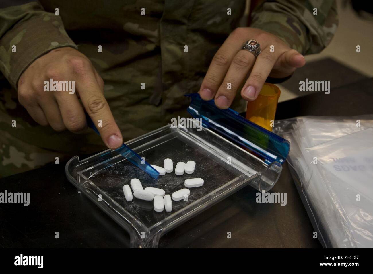Spc. Benjamin S. Hong, a pharmacy technician in the U.S. Army Reserve ...