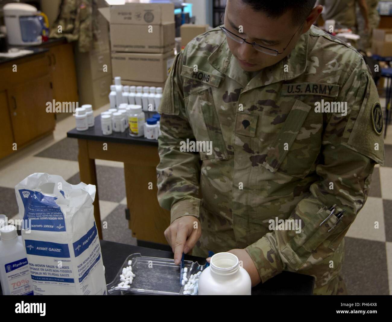Spc. Benjamin S. Hong, a pharmacy technician in the U.S. Army Reserve ...
