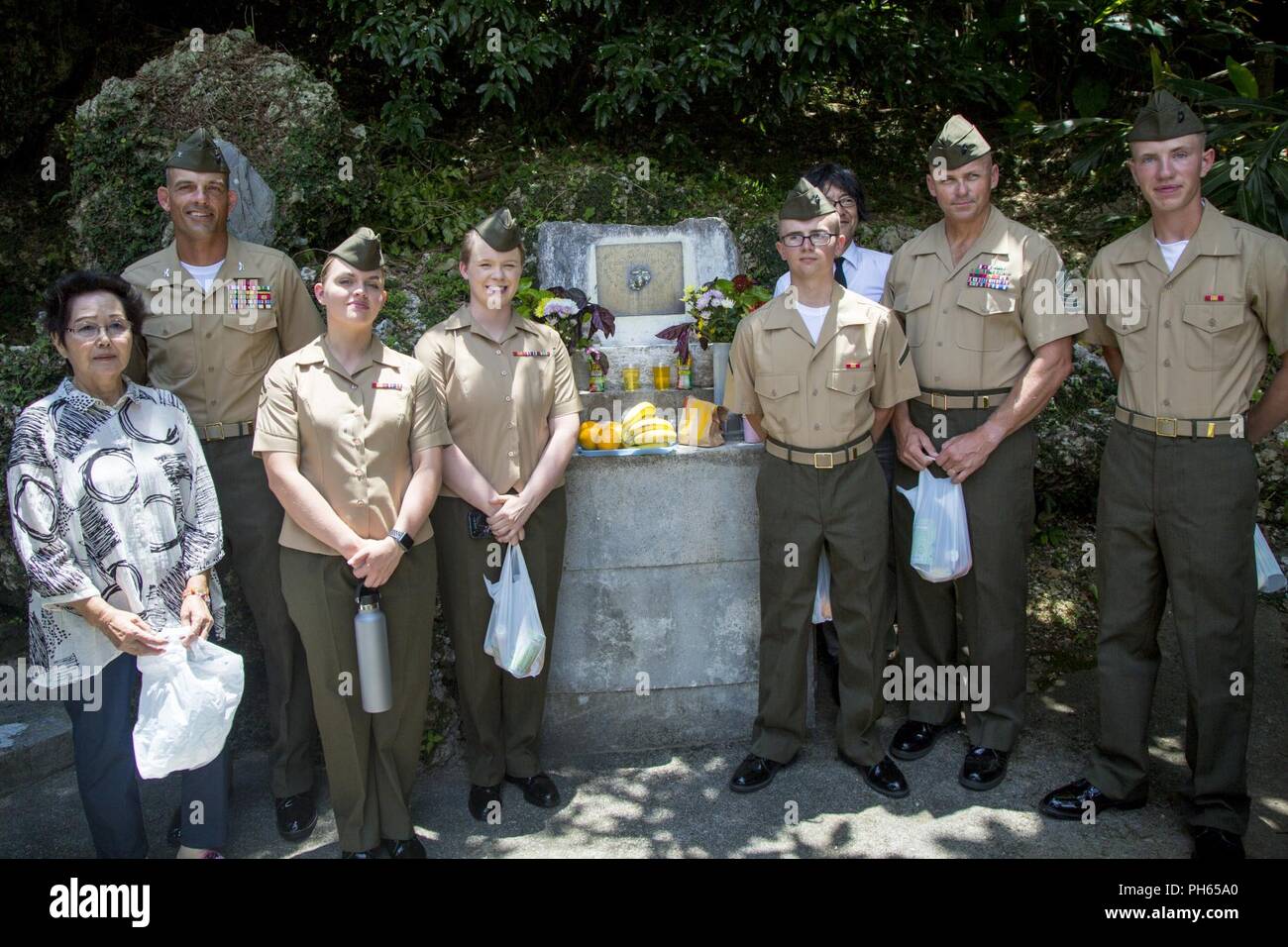 HAMAHIGA ISLAND, OKINAWA, Japan – Members of the local community and ...
