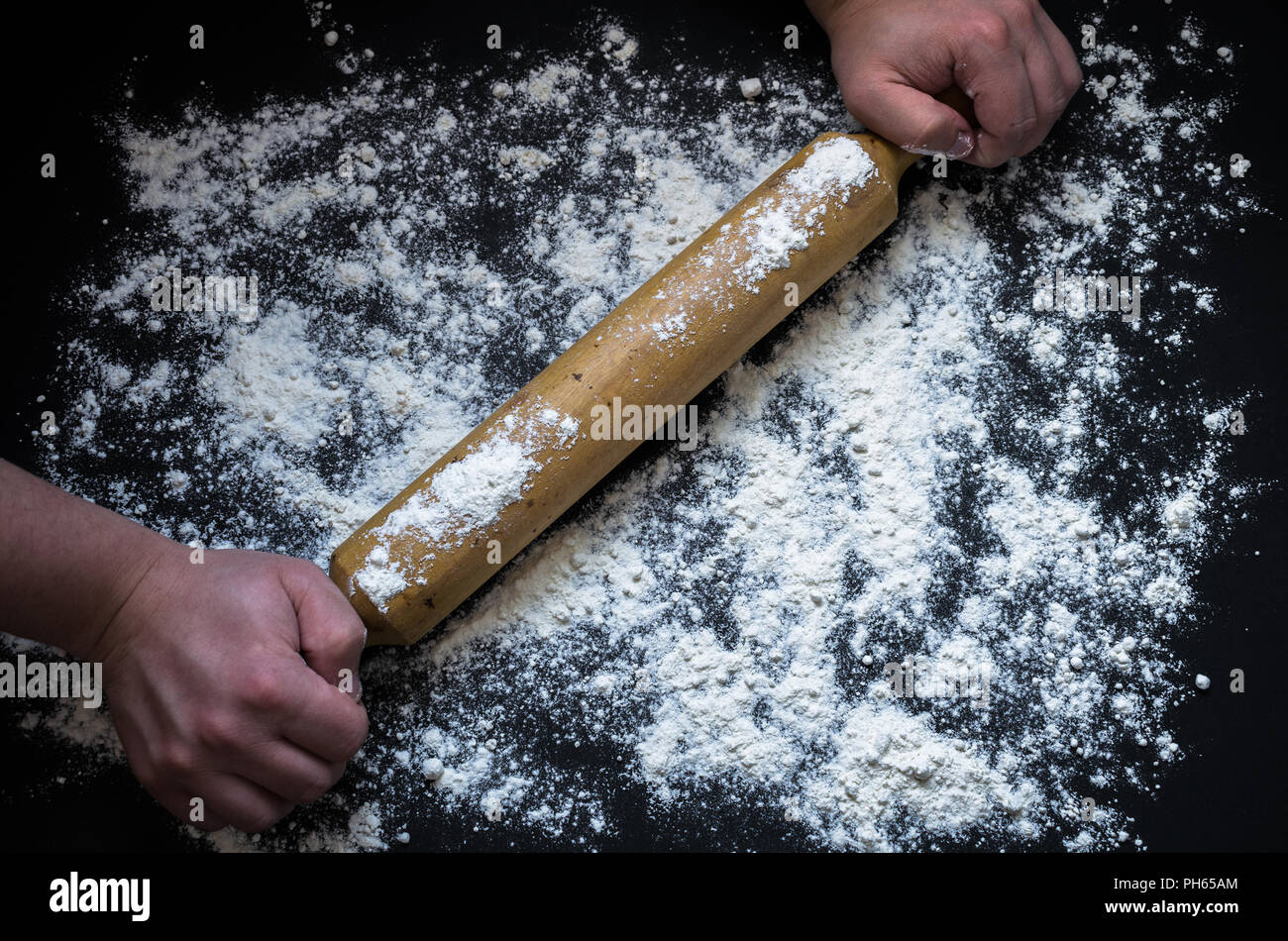 Hands taking a rolling pin hi-res stock photography and images - Alamy Hands taking a rolling pin hi-res stock photography and images - Alamy