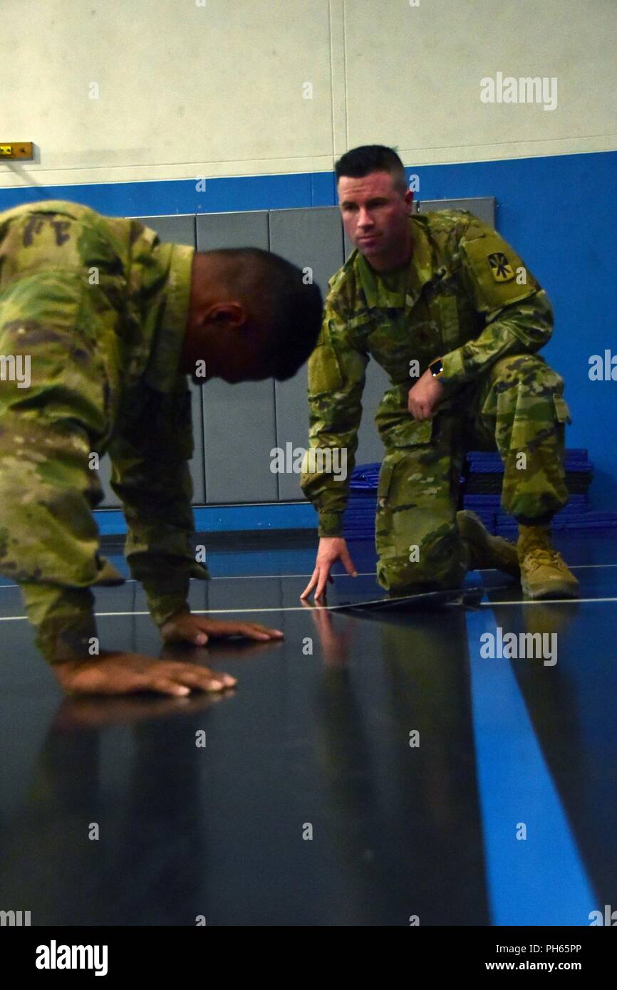U.S. Army Staff Sgt. Adam Ballard, a Charlie Battery platoon sergeant 5 ...