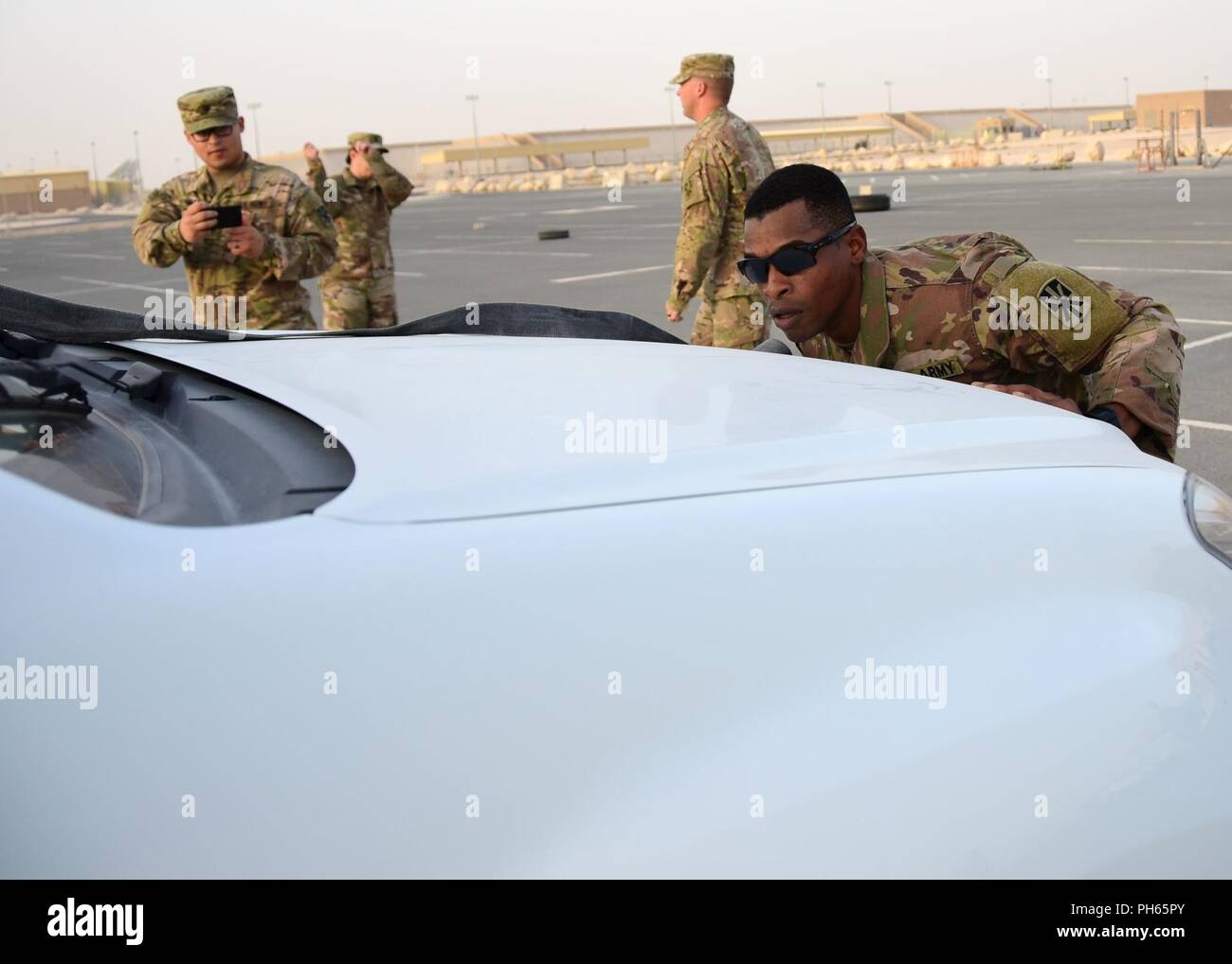 U.S. Army Staff Sgt. Michael Bell, a section sergeant with Headquarters ...