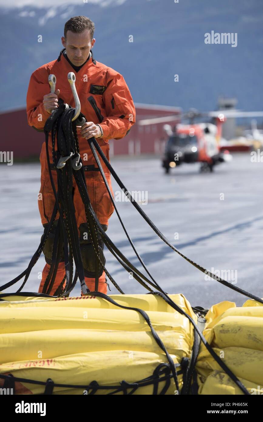 Petty Officer 2nd Class Justin Bergman, member of Coast Guard Air ...