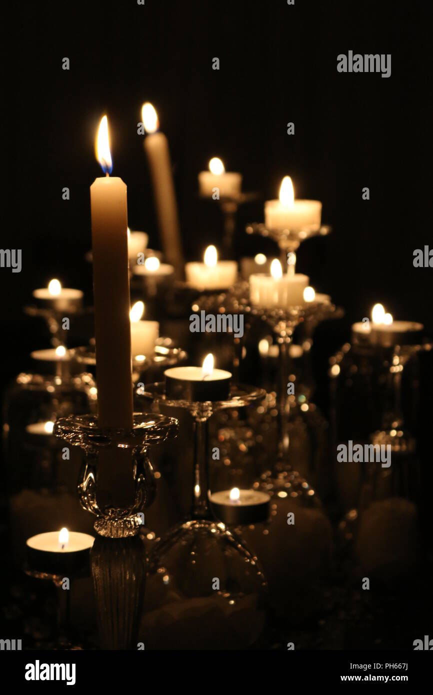 Flickering candles hi-res stock photography and images - Alamy