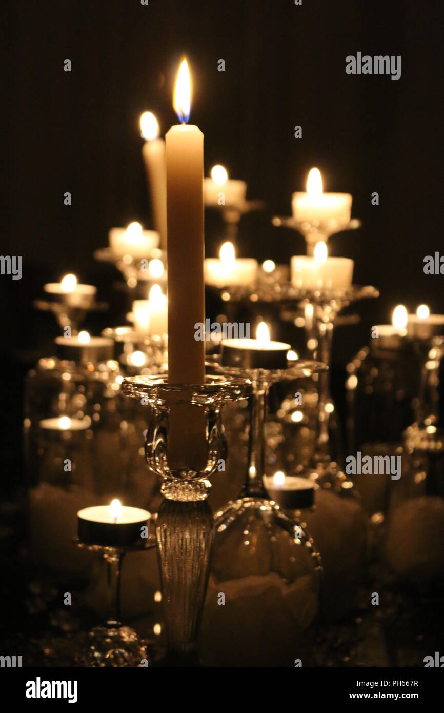 Flickering candles hi-res stock photography and images - Alamy