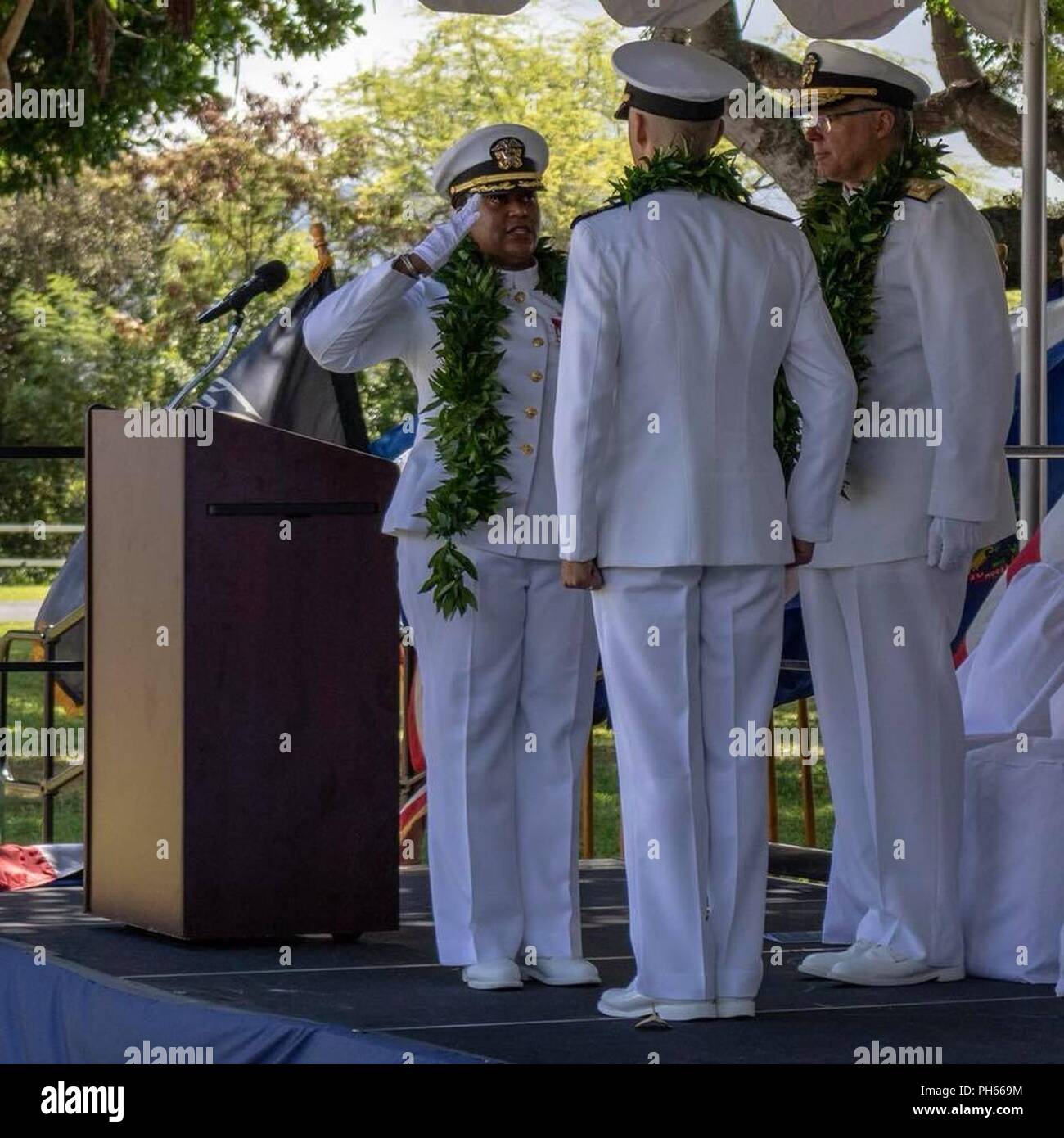 HONOLULU (June 22, 2018) Capt. Madelene Means salutes Capt. Todd Gagnon ...