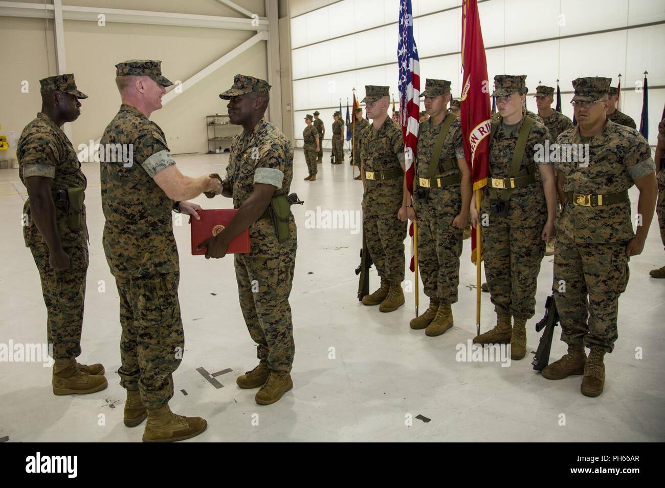 Col. Russell C. Burton, left, commanding officer, Marine Corps Air ...