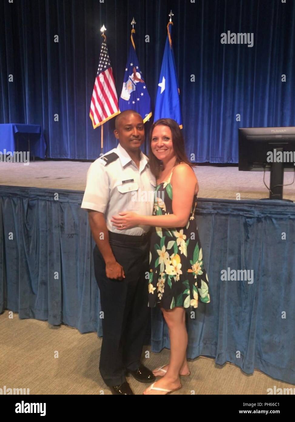 1st Lieutenant Kenneth Ellison poses for a picture with his wife ...