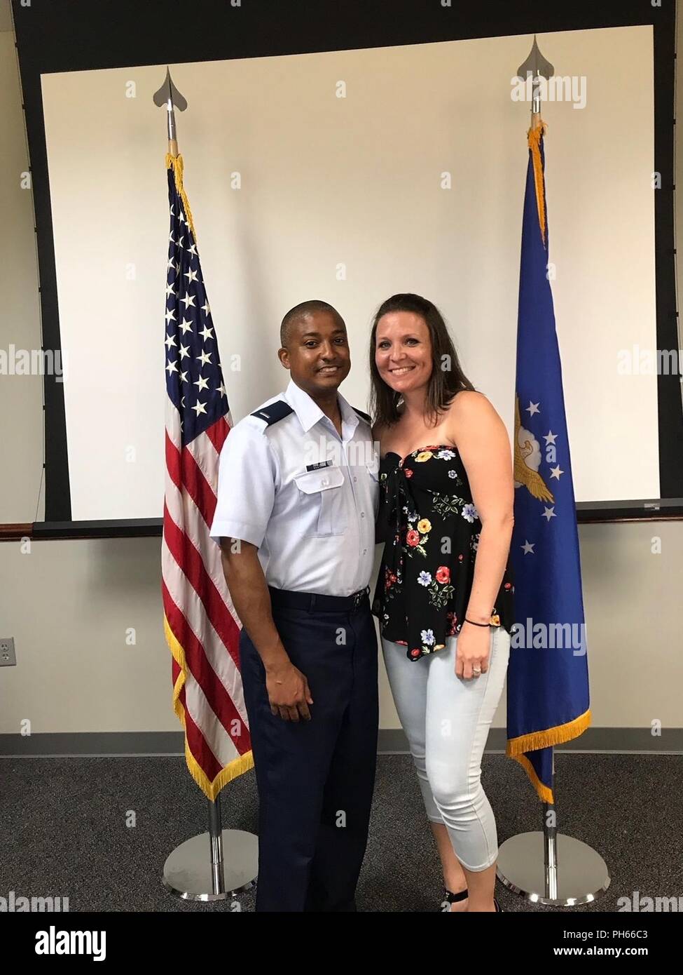 1st Lieutenant Kenneth Ellison poses for a picture with his wife ...