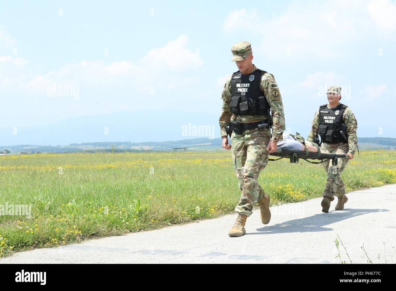 Sgt. Joseph Adams and Pfc. Vivian Whitman, with the 977th Military ...
