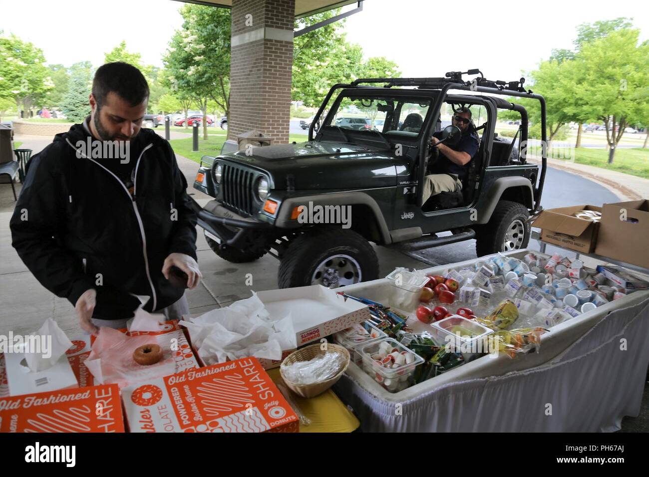 Fort McCoy, Wis., community members get a free drive-thru breakfast at ...