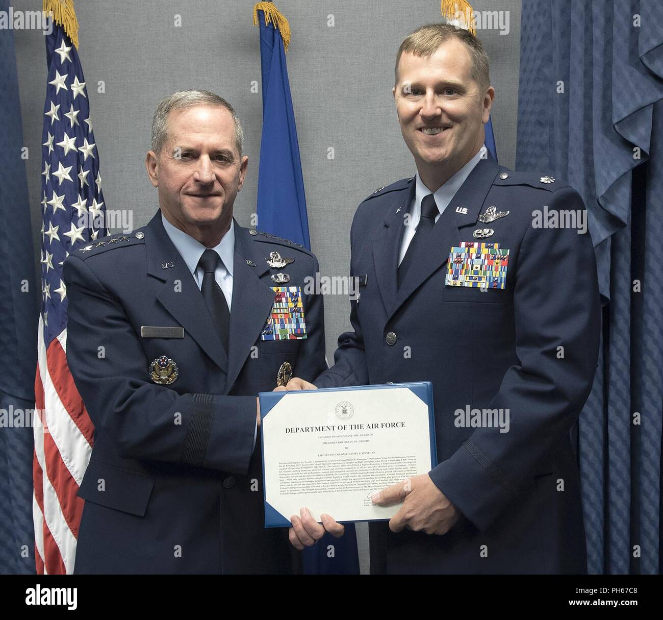 Lt. Col Daniel Finnegan receives the Koren Kolligian Trophy certificate ...