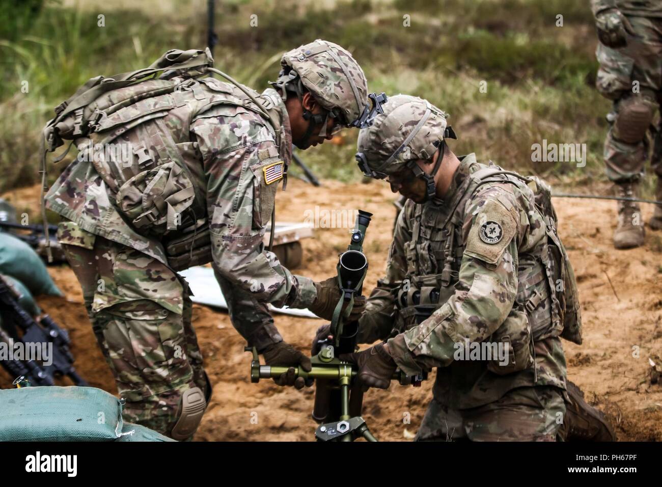 U.S. Army Soldiers with 1st Squadron, 2nd Cavalry Regiment, set up a ...
