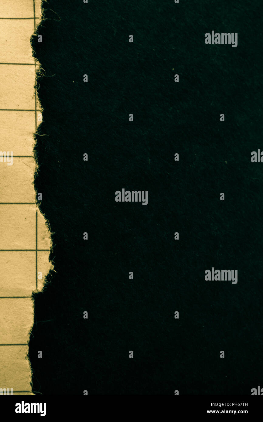 Chain and torn paper on a dark background Stock Photo - Alamy