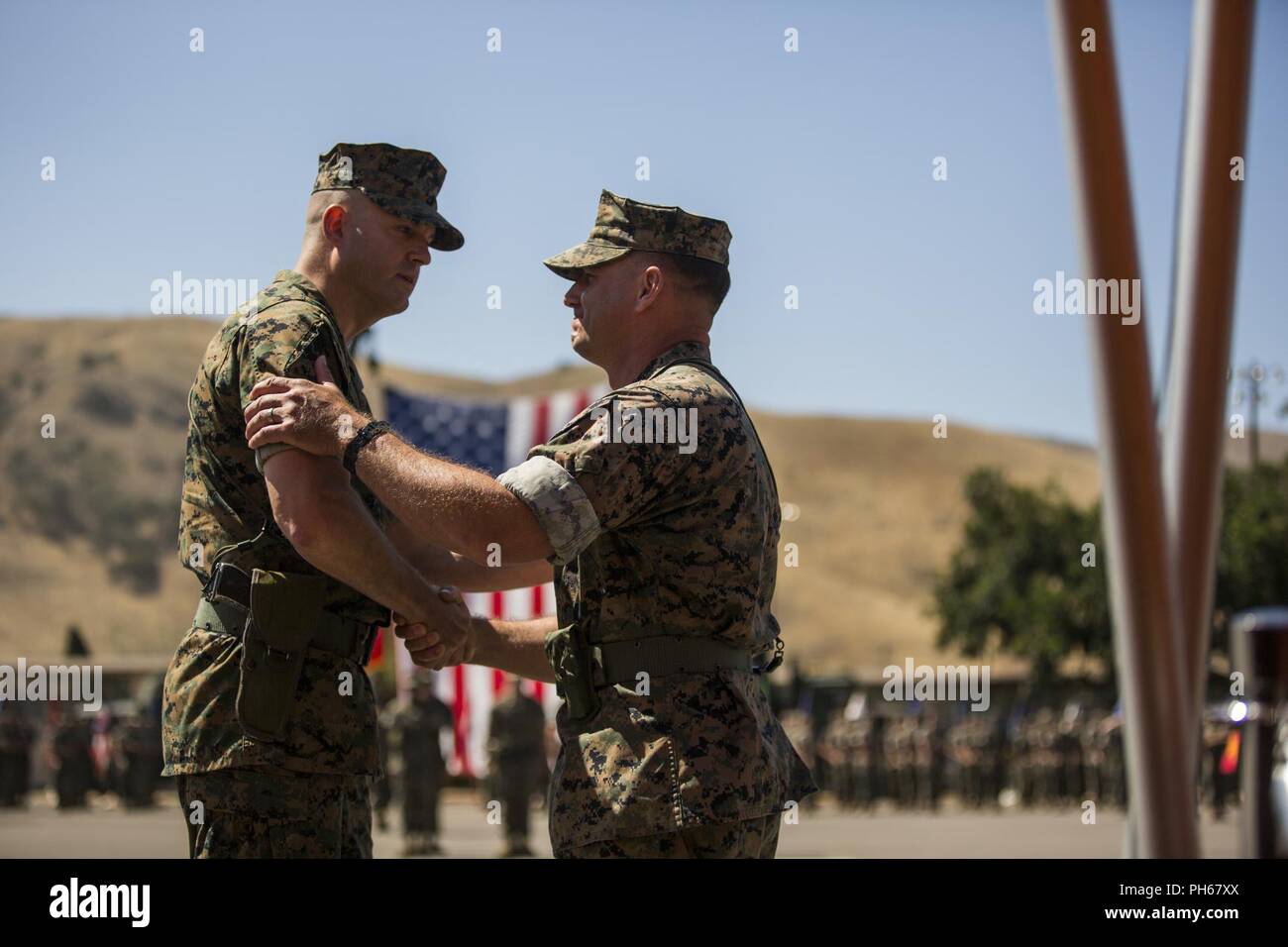U.S. Marine Corps Lt. Col. Caleb Hyatt, left, incoming commanding ...