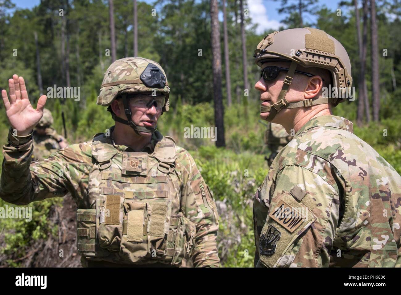 Tech Sgt. Daniel Green, left, 822d Base Defense Squadron fire team ...