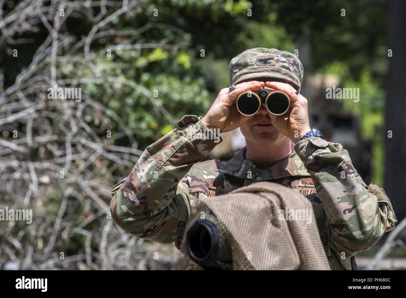 Col. Paul Birch, 93d Air Ground Operations Wing (AGOW) commander, looks ...