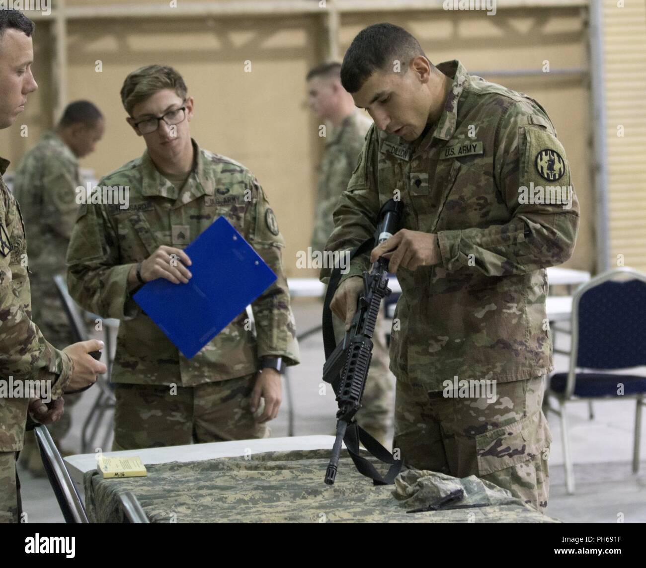 U.S. Army Spc. Alexander Dillon, a military policeman assigned to the ...