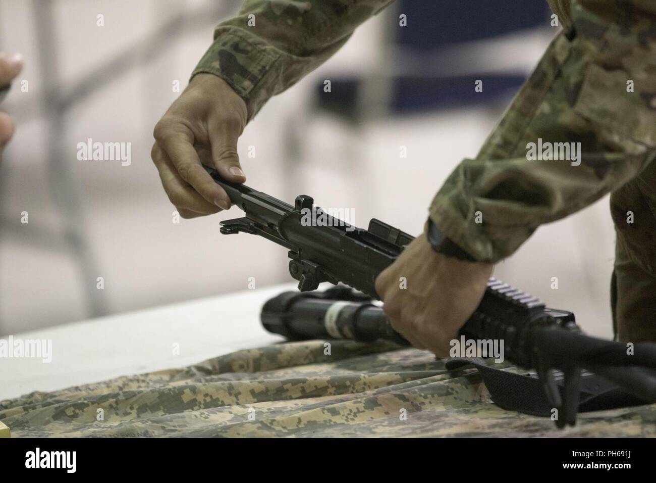 U.S. Army Spc. Alexander Dillon, a military policeman assigned to the ...