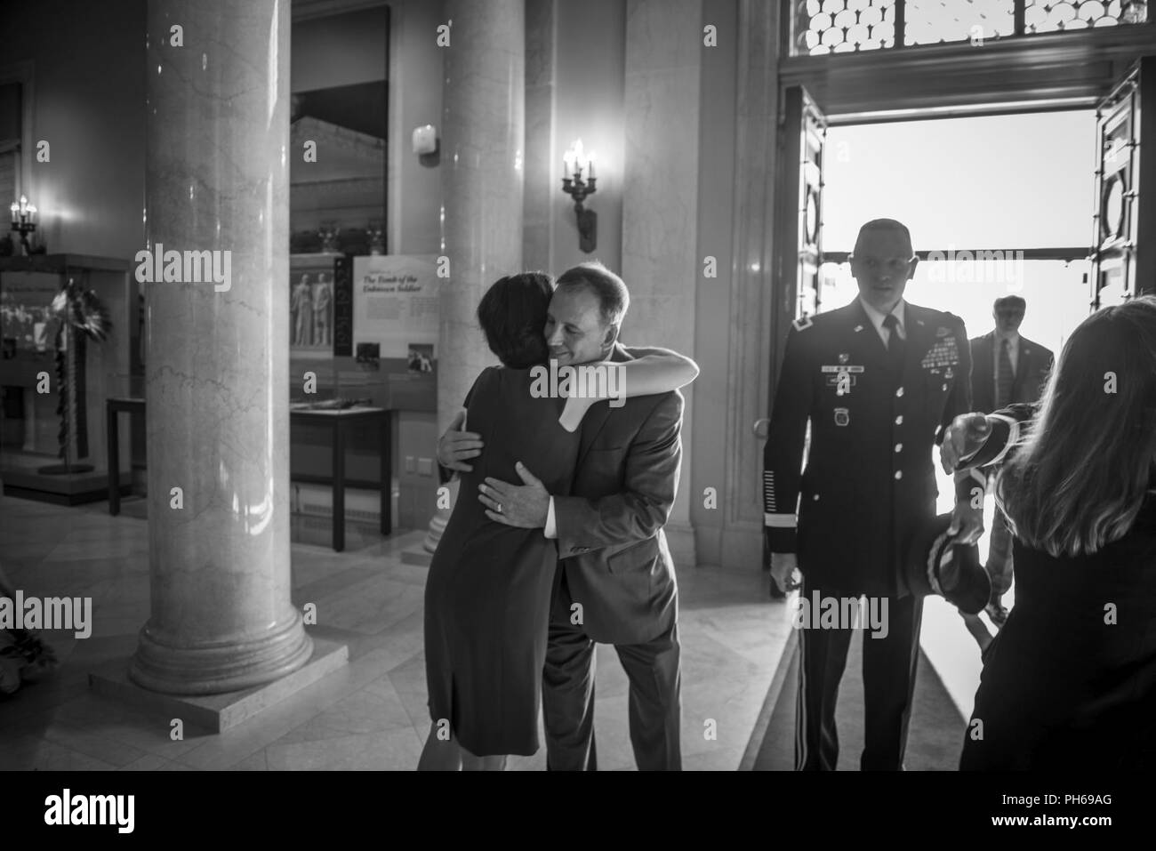 Katharine Kelley, superintendent, Arlington National Cemetery, hugs ...