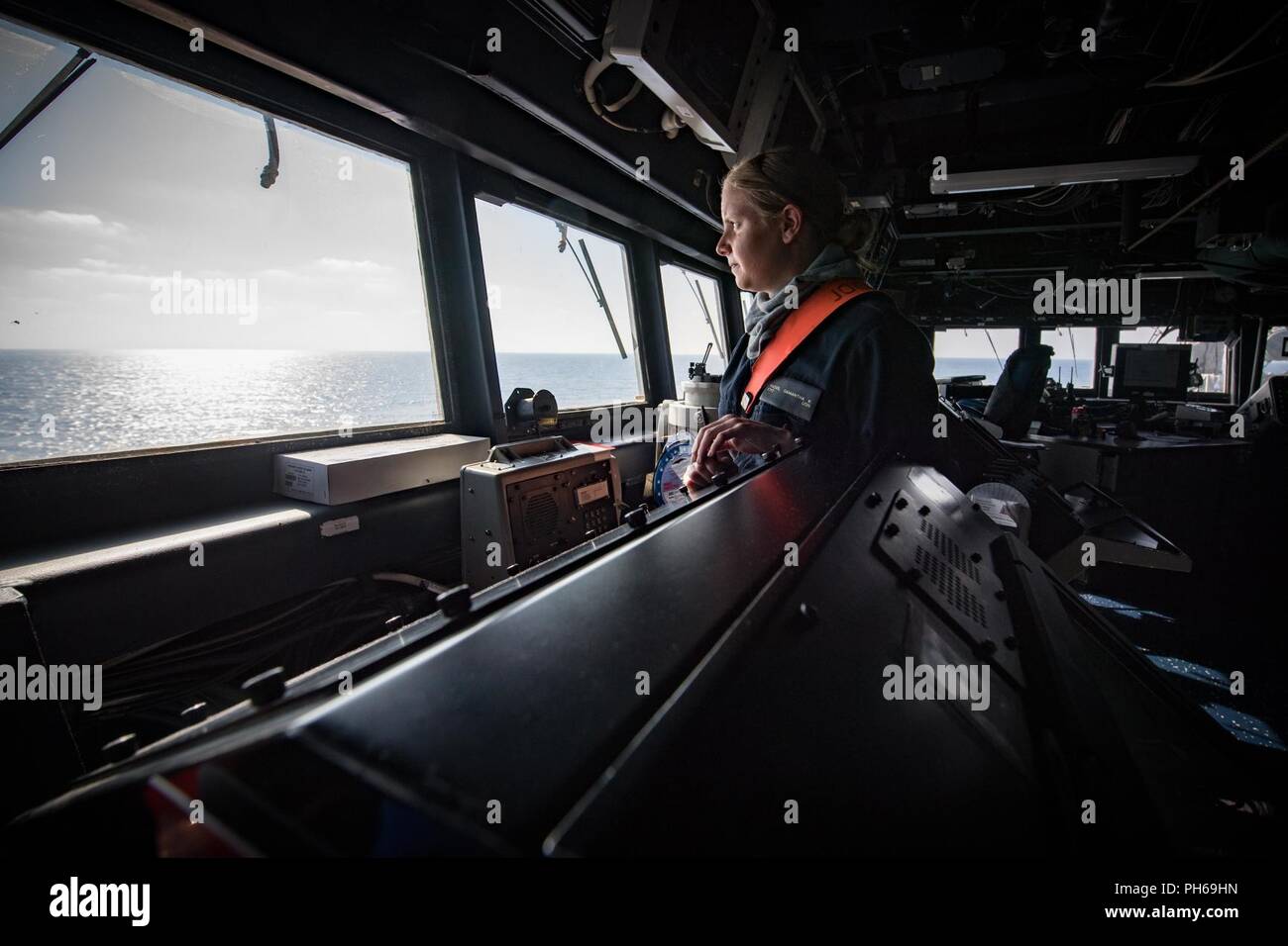 MEDITERRANEAN SEA (June 26, 2018) Ensign Samantha Rados stands watch as ...