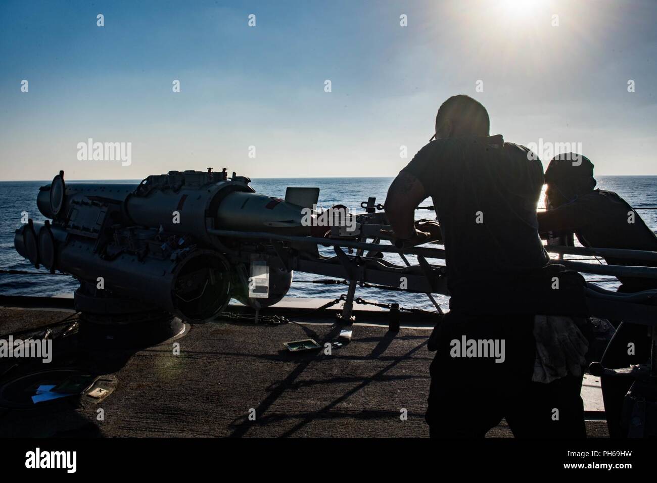 MEDITERRANEAN SEA (June 26, 2018) U.S. Navy Sailors load a Mark 46 ...