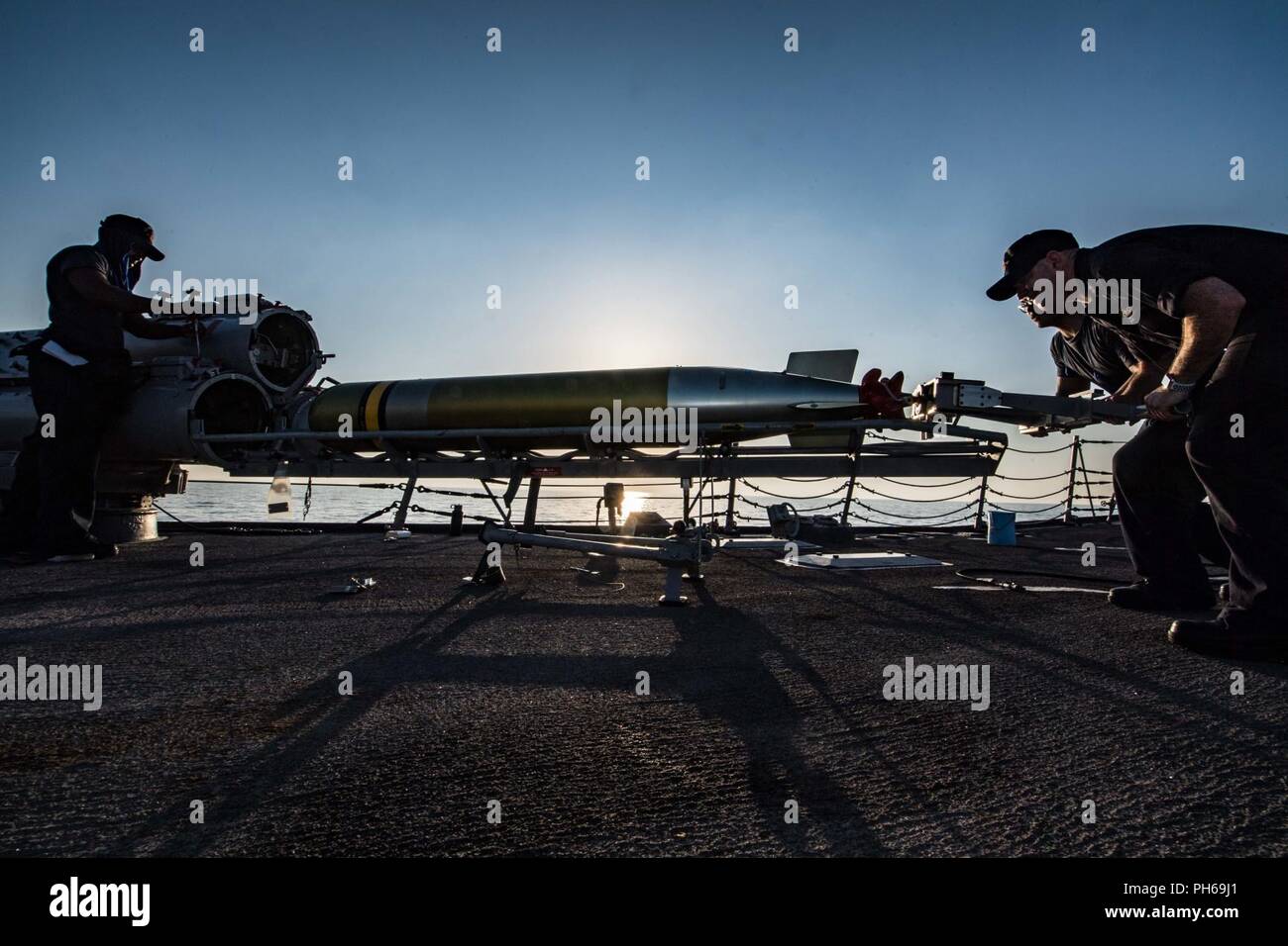 MEDITERRANEAN SEA (June 26, 2018) U.S. Navy Sailors load a Mark 46 ...