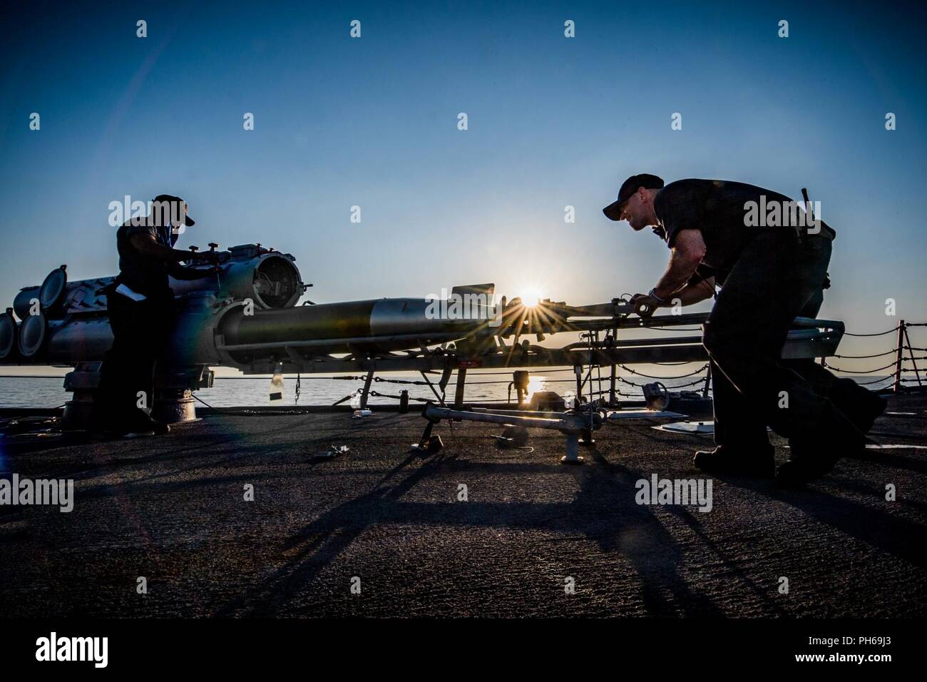MEDITERRANEAN SEA (June 26, 2018) U.S. Navy Sailors load a Mark 46 ...