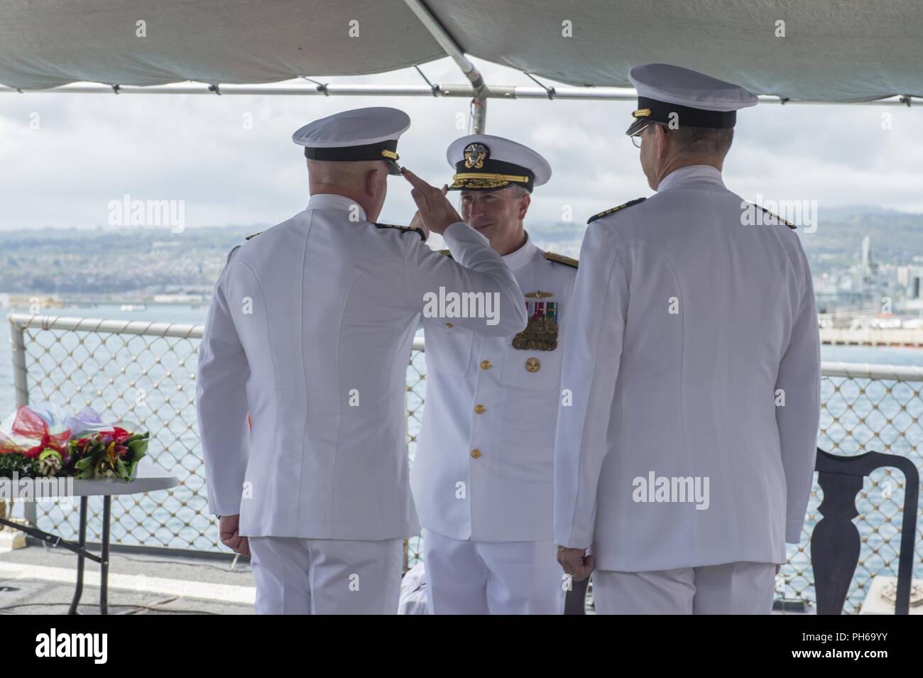 PEARL HARBOR (June 28, 2018) Capt. Joseph Ring salutes Rear Adm. Brian ...